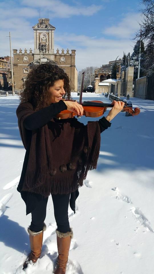 Girl Playing Violin In Snow